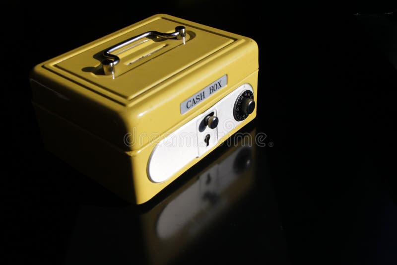 Yellow Money Box with Numeric Combination Stock Photo - Image of black ...