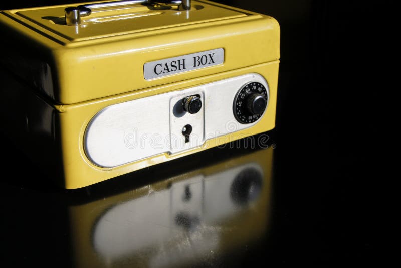 Yellow Money Box with Numeric Combination Stock Photo - Image of black ...