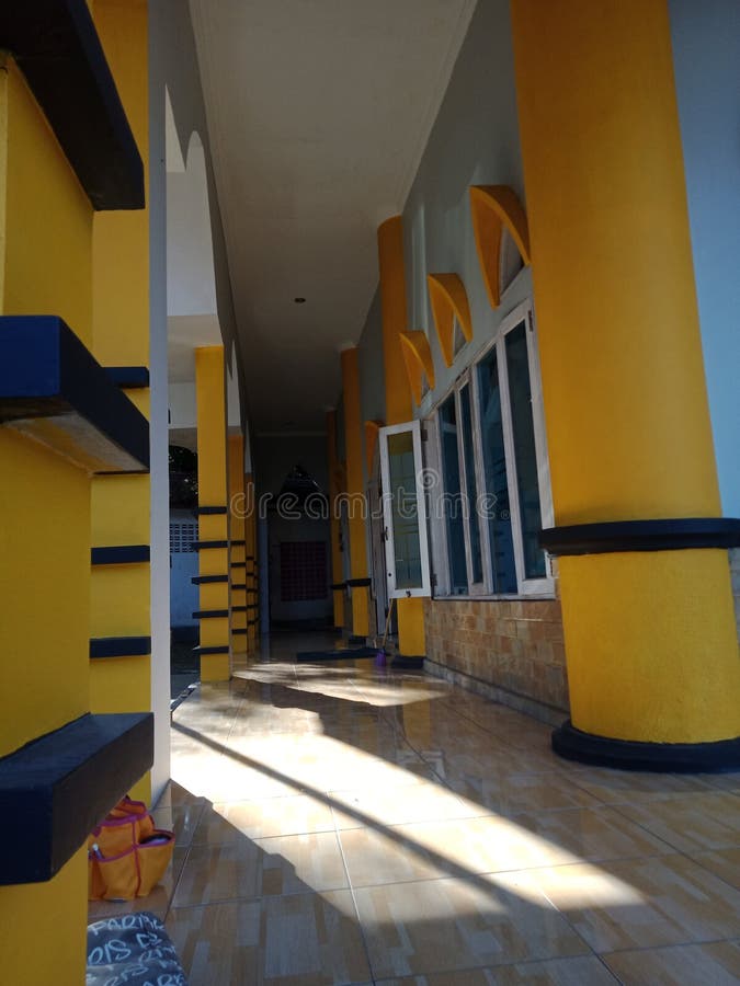 Yellow mosque in sunbeam stock photo. Image of sunlight - 201297272