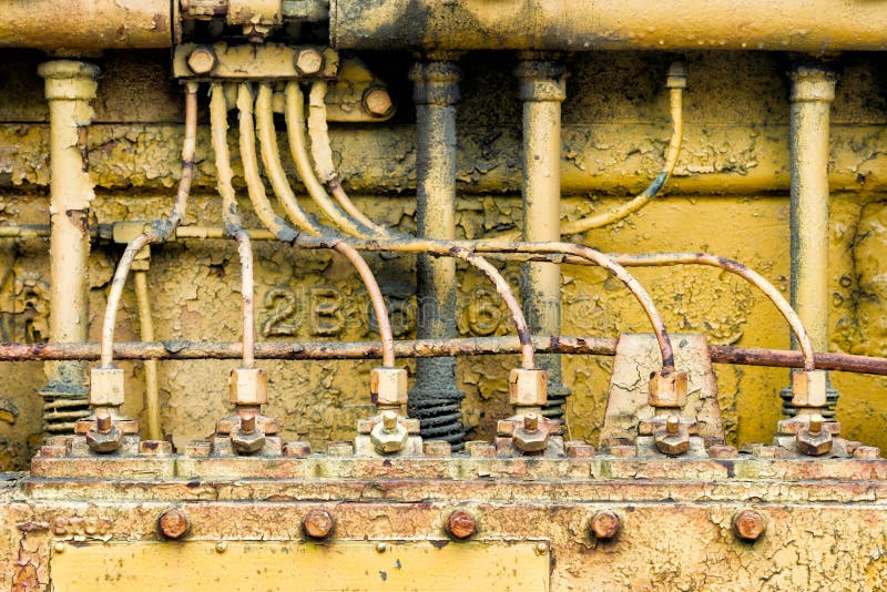 Yellow motor stock photo. Image of outside, motor, plugs - 33768926