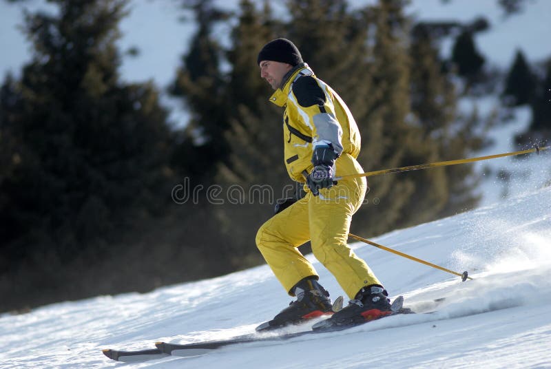 Yellow mountain skier stock image. Image of people, powder - 1690937