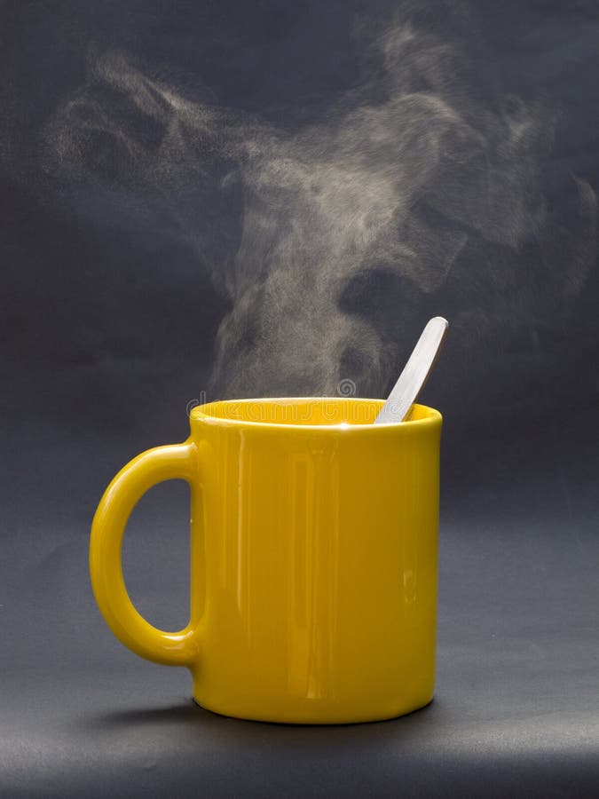 Yellow mug with steam stock photo. Image of culture, kitchen - 18773380