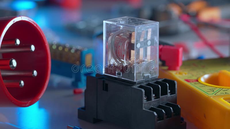 Yellow Multimeter and Relay with Electromagnetic Coils of Direct and ...