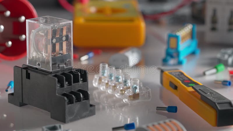 Yellow Multimeter and Relay with Electromagnetic Coils of Direct and ...