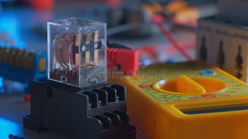 Yellow Multimeter and Relay with Electromagnetic Coils of Direct and ...