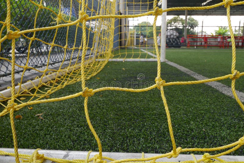 Yellow net of soccer goal stock image. Image of field - 29420531