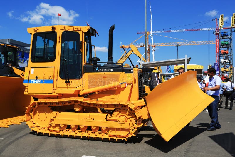 Yellow new tractor editorial photography. Image of factory - 70569277