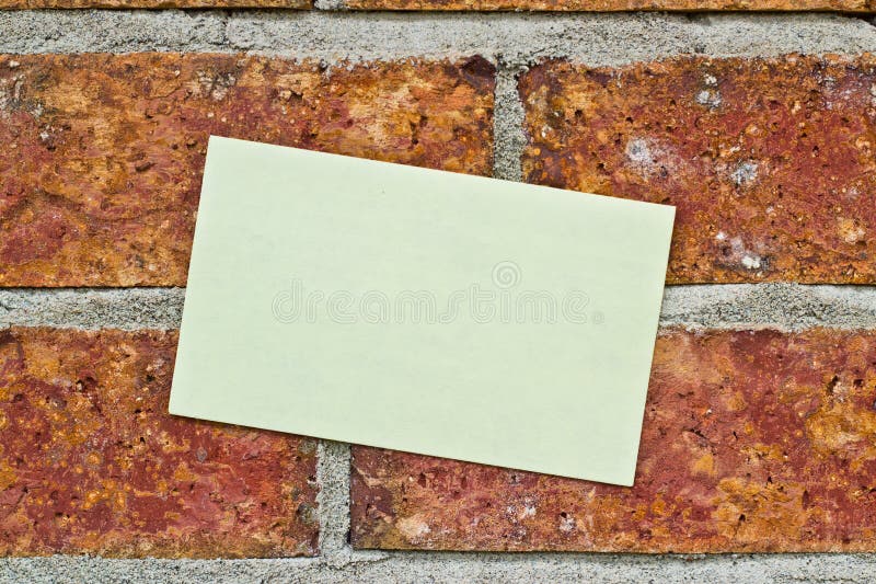 Yellow Note on brick wall stock image. Image of yellow - 25489575