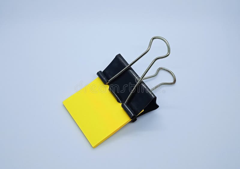 Yellow Note Paper with Black Binder Clip. Binder Clip and Stack of ...