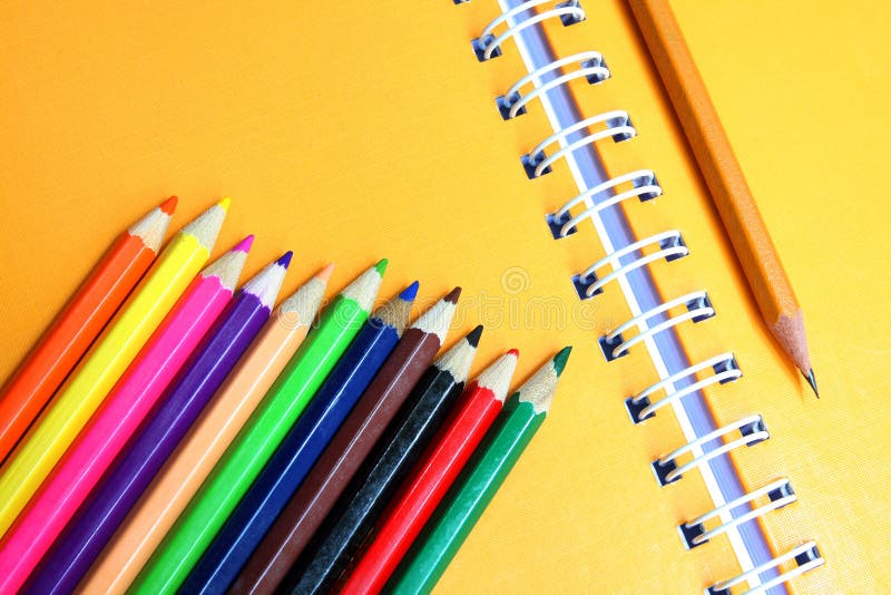 Yellow Notebook and Colour Pencils Stock Image - Image of group, draw ...