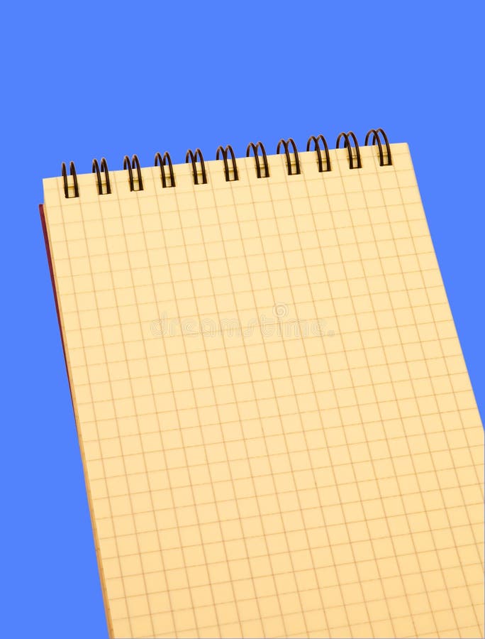 Yellow Notebook Over Blue Background Stock Photo - Image of attach ...