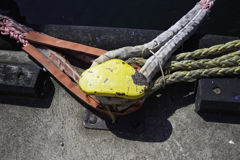 A Yellow Object is Tied To a Rope Stock Photo - Image of fishing ...