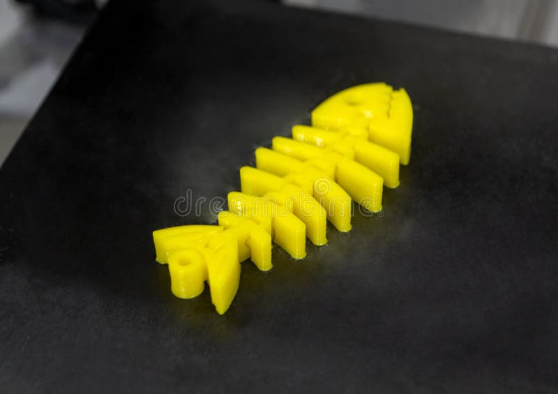 Yellow Objects Printed on 3D Printer from Plastic. New 3D Printing ...