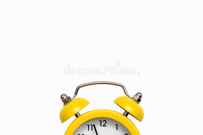 Yellow Old-fashioned Alarm Clock with a Dial on a White Background with ...
