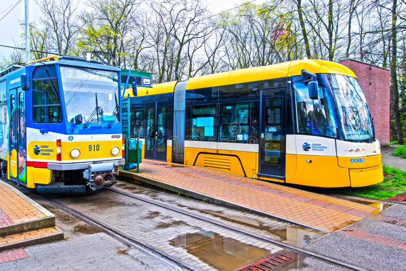 Yellow Old and Modern Trams in the City Editorial Stock Photo - Image ...