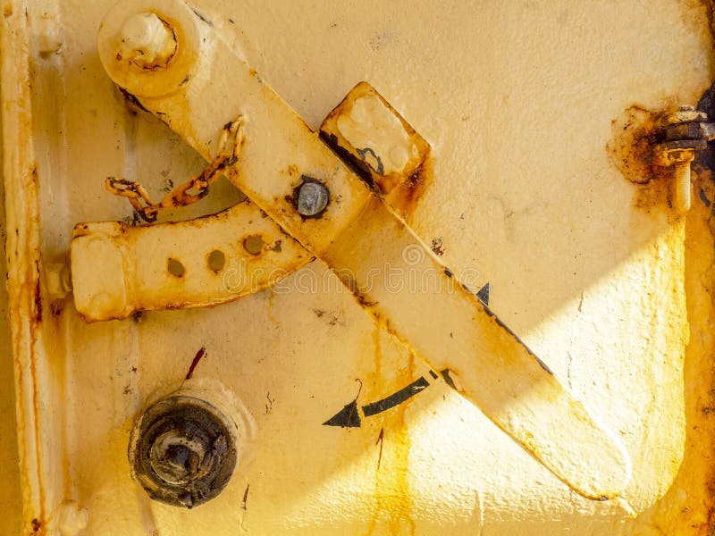 Yellow Old Rusted Marine Hatch with Handle. Front View Stock Photo ...