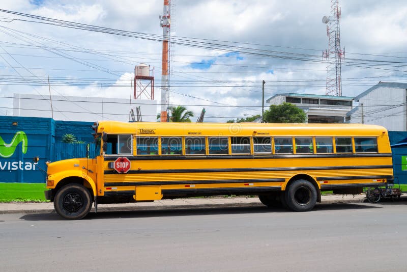 Yellow Old School Bus Parked in the Street Editorial Stock Photo ...