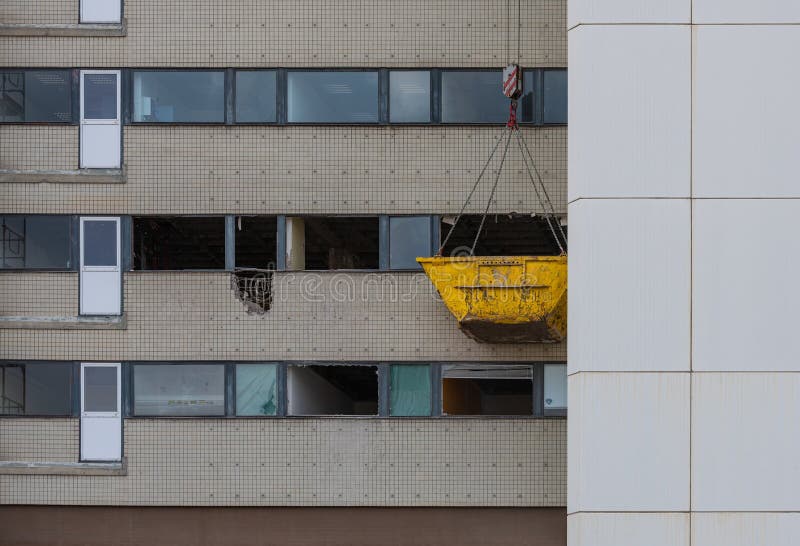 Yellow Old Skip Bin Hanging on Chains Stock Image - Image of metal ...