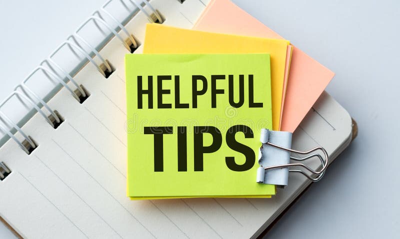 A Yellow and Orange Sticky Note with the Word Helpful Tips Written on ...