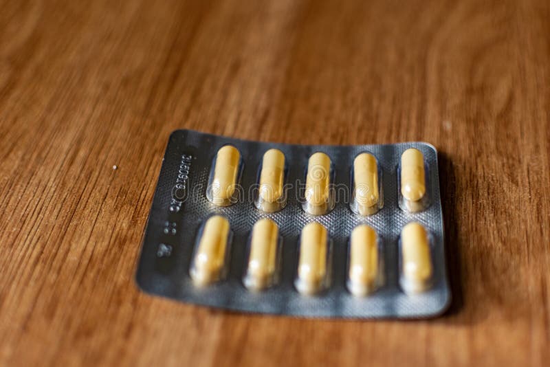 Yellow, Oval-shaped Tablets in Capsules, Absorbable Shell with Powder ...