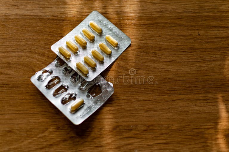 Yellow, Oval-shaped Tablets in Capsules, Absorbable Shell with Powder ...