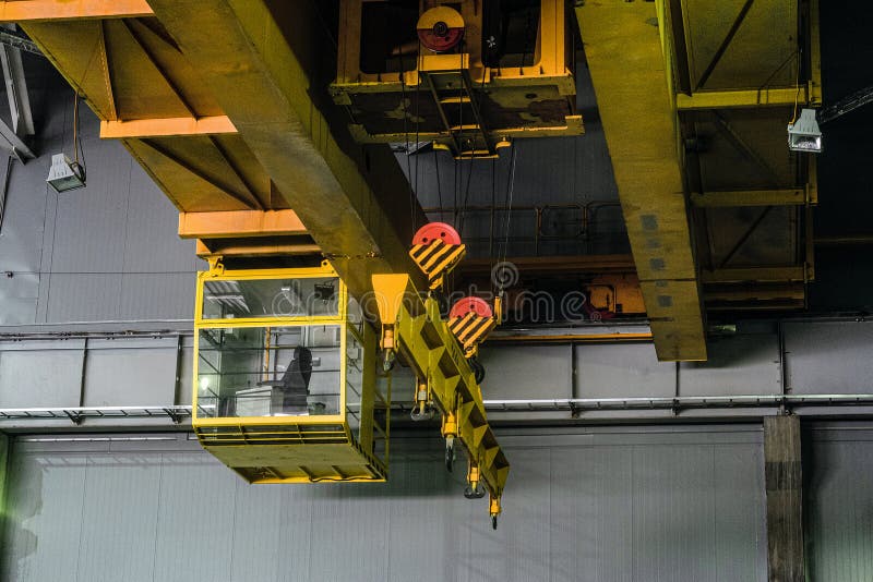 Yellow Overhead Crane with Linear Traverse and Hooks in Engineering ...