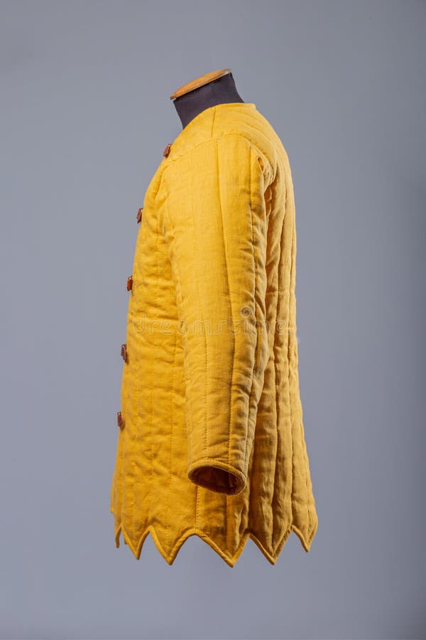 Yellow Padded Gambeson Jacket. Stock Image - Image of quilted, still ...