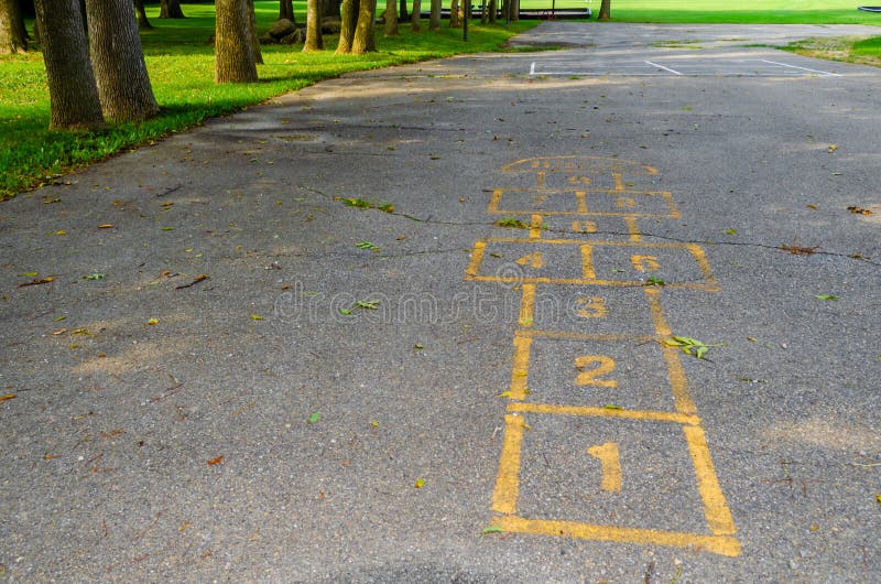 Yellow Painted Hopscotch Game on Pavement Stock Photo - Image of play ...