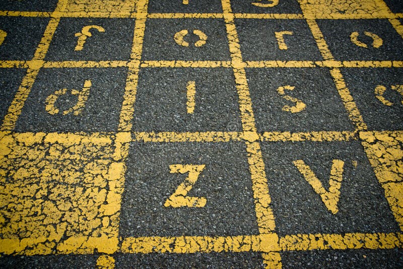 Yellow Painted Letters on Asphalt Stock Photo - Image of game, paint ...