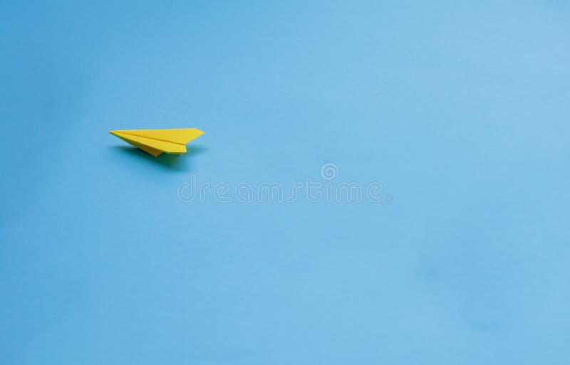 Yellow Paper Airplane on Blue Background Stock Photo - Image of ...