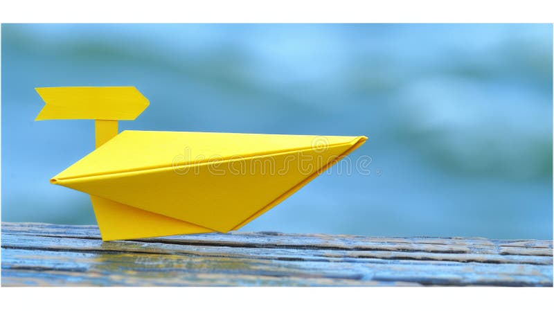 A yellow paper boat stock photo. Image of creative, copy - 320560392