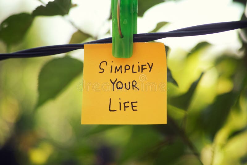 A Yellow Paper Note with the Phrase Simplify Your Life Written on it ...