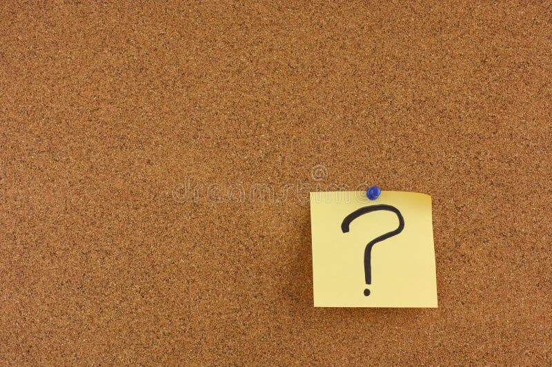 A Yellow Paper Note with a Question Mark on it Pinned To a Cork Board ...