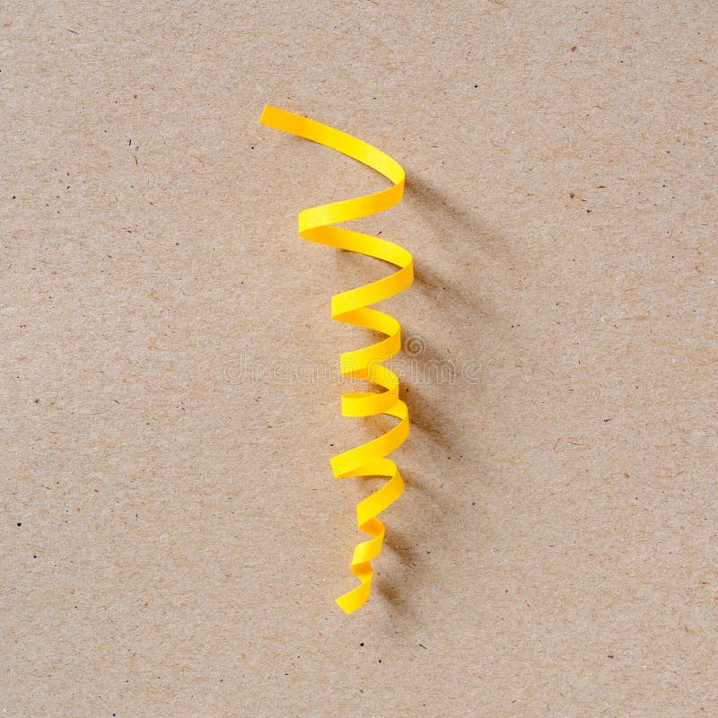 Yellow paper streamer stock image. Image of curl, celebration - 124276699
