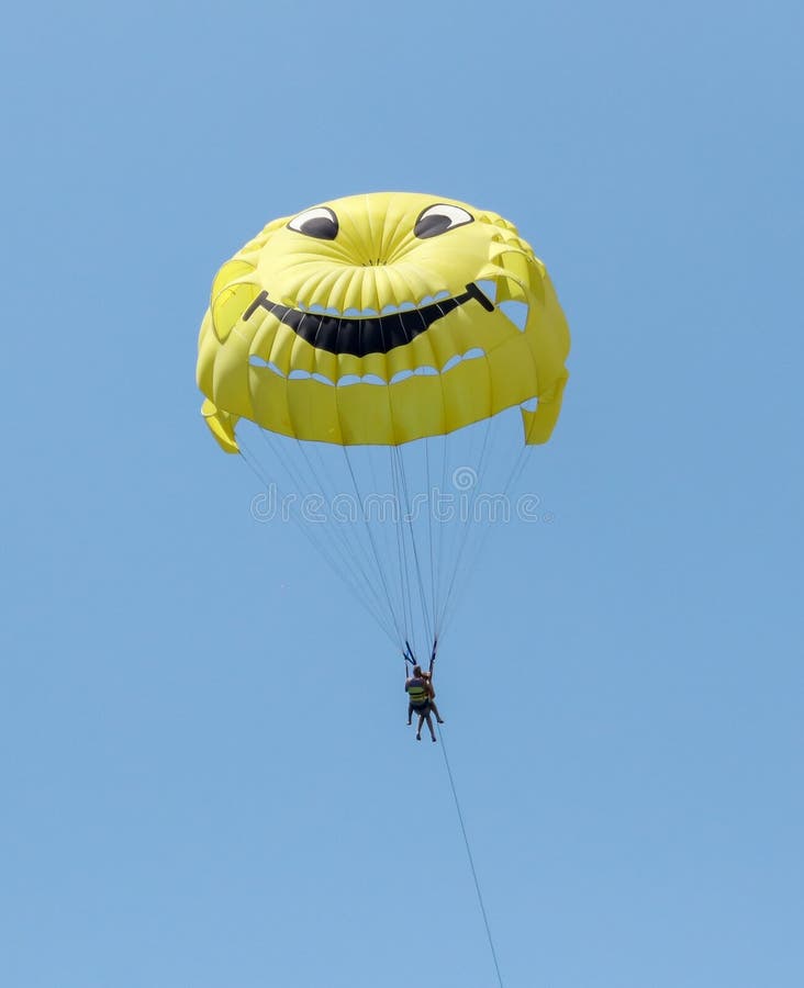 A Yellow Parachute Flies in the Sky Stock Image - Image of wind ...