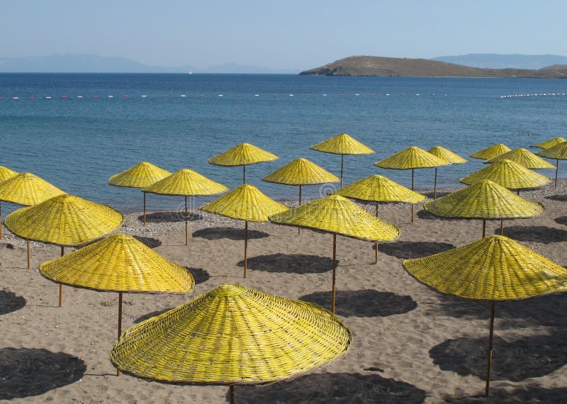 Parasols on Beach stock image. Image of sunbathing, season - 10075937