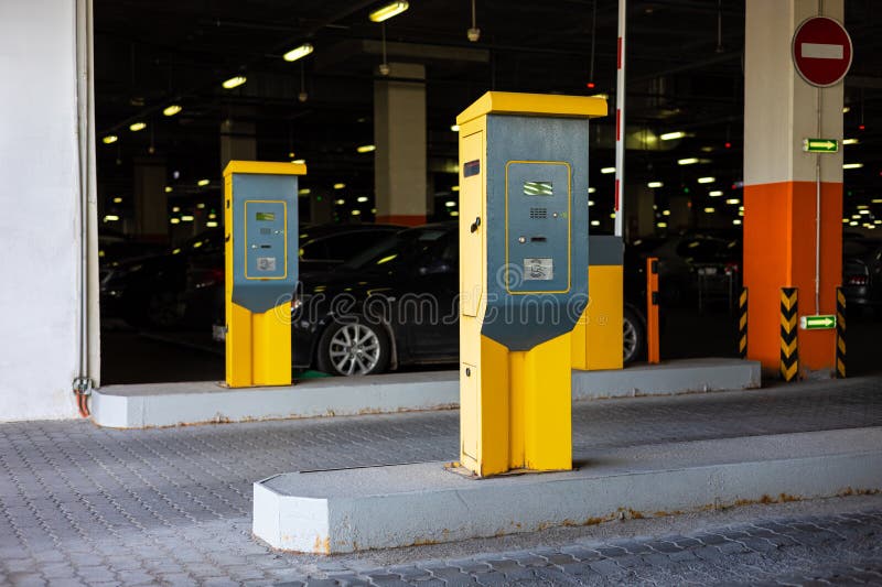 Yellow Parking Meter in the Car Park. Stock Photo - Image of validator ...