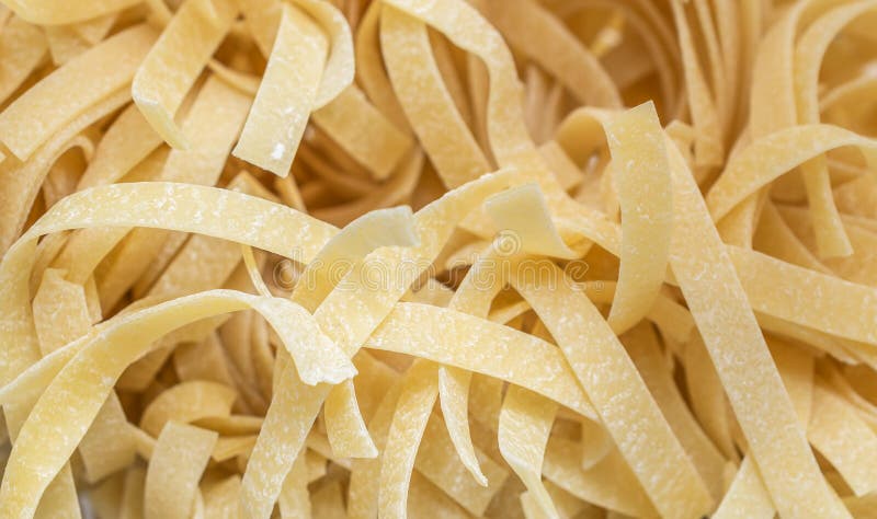 Yellow Pasta with Visible Details. Background or Texture Stock Photo ...