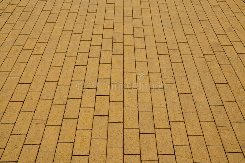 Yellow paving slabs stock photo. Image of laying, ground - 76532824