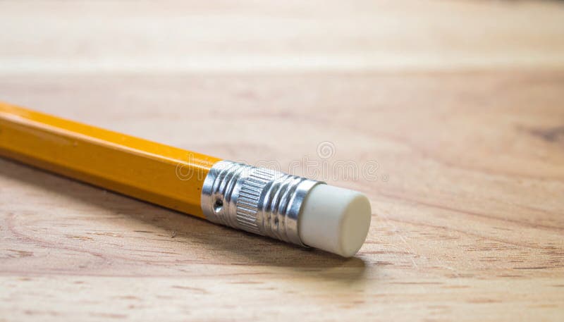 Yellow Pencil and Eraser on Wooden Desk Stock Illustration ...