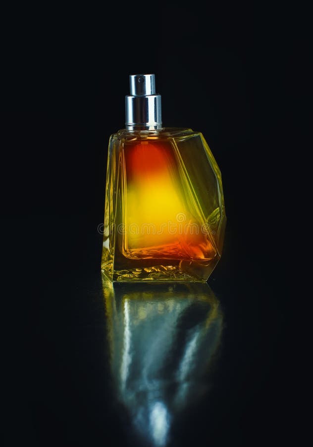 Yellow Perfume bottle stock image. Image of fragrant - 66217811