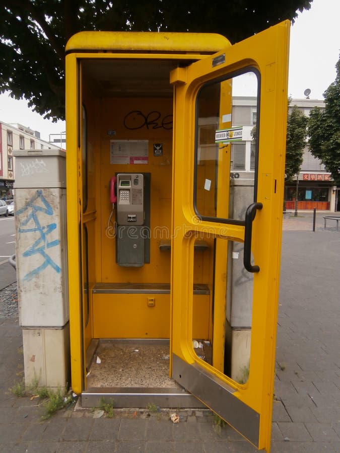 Yellow Phone Booth editorial stock photo. Image of yellow - 58305308