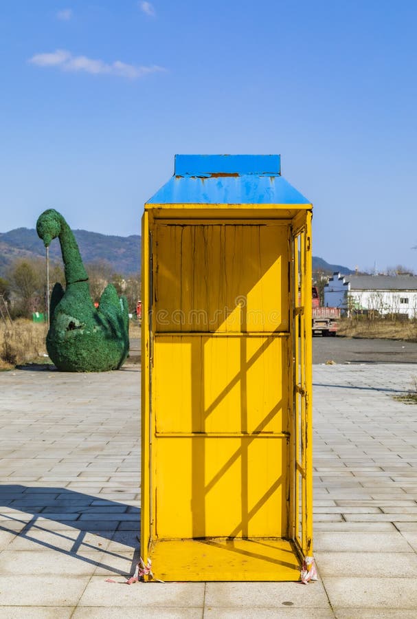 Yellow Phone Booth in the Park Stock Image - Image of yellow, wood ...