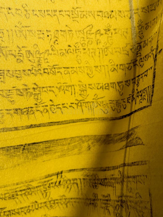 A Yellow Piece of Fabric with Writing on it Stock Image - Image of ...