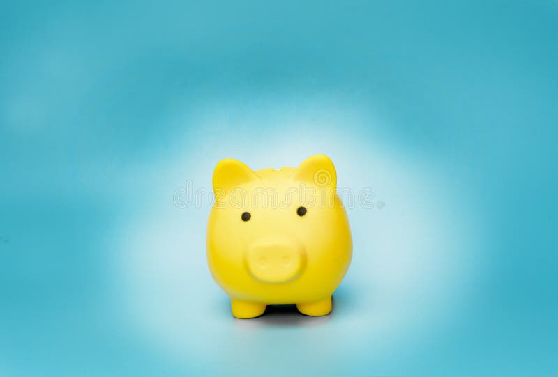 Yellow Piggy Bank on Blue Background Stock Image - Image of change ...
