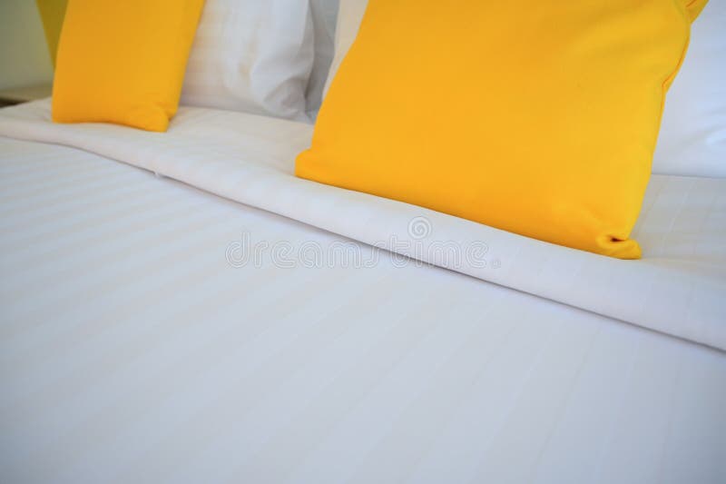 Close Up Yellow Pillow on White Bed, Interior Design Stock Photo ...