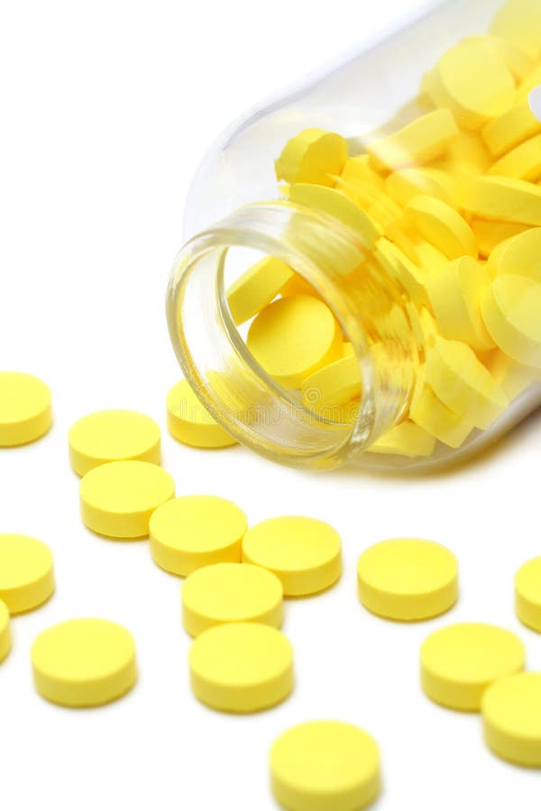 Yellow pills stock image. Image of close, preventative - 10463397