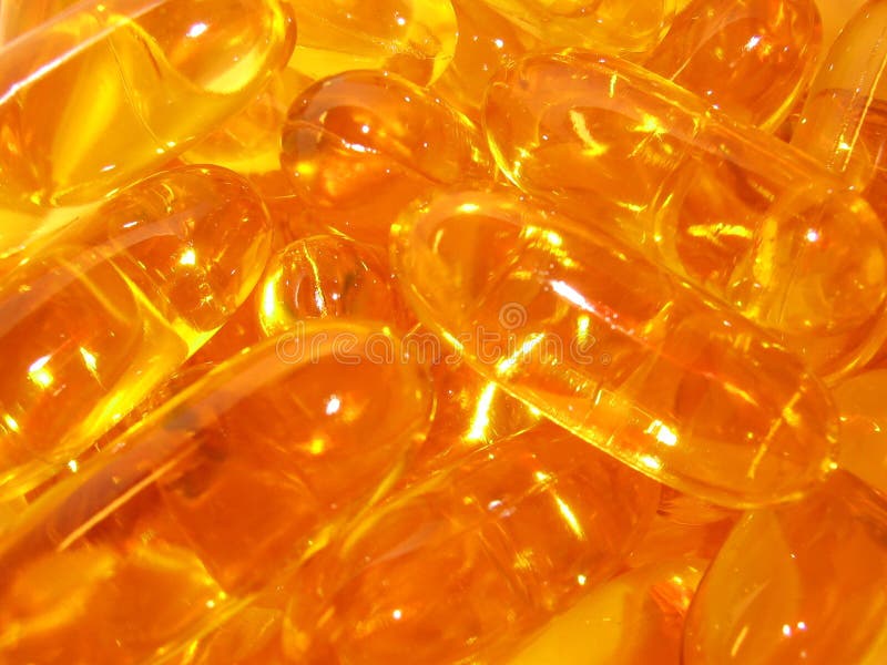 Yellow pills stock photo. Image of gold, capsule, healthy - 731832