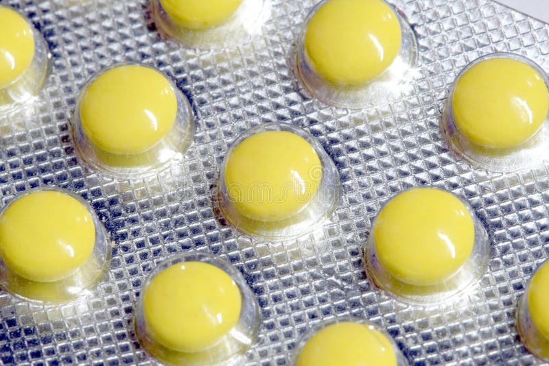 Yellow pills stock image. Image of package, chemistry - 7525345
