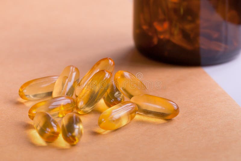 Yellow Pills and Bottle Close Up Stock Image - Image of bottle, cure ...